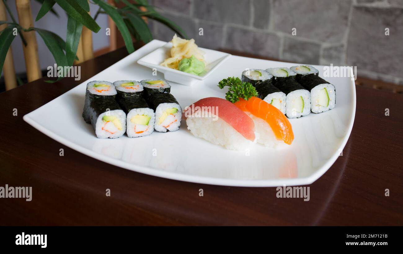 Set of sushi with variety of makis, nigiris and sashimi with fine fish ...