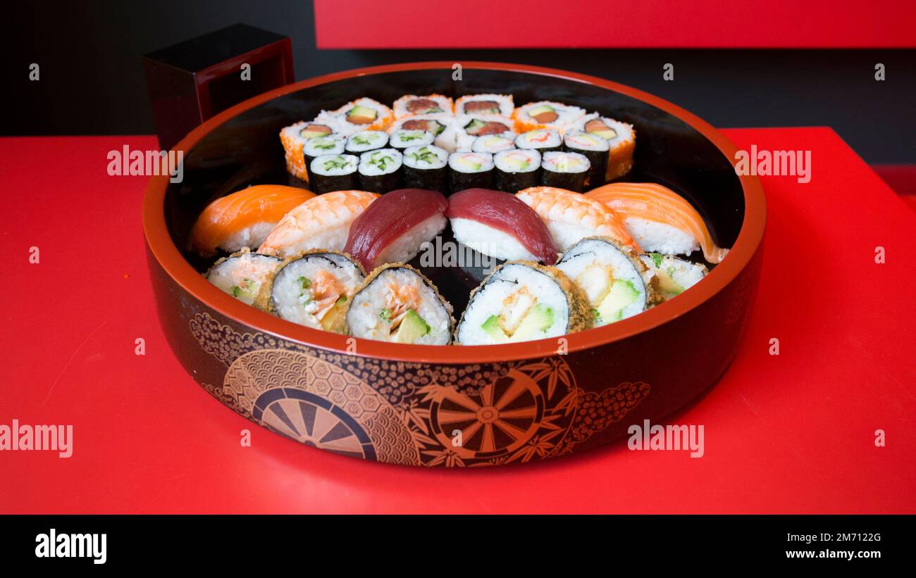 Set of sushi with variety of makis, nigiris and sashimi with fine fish ...
