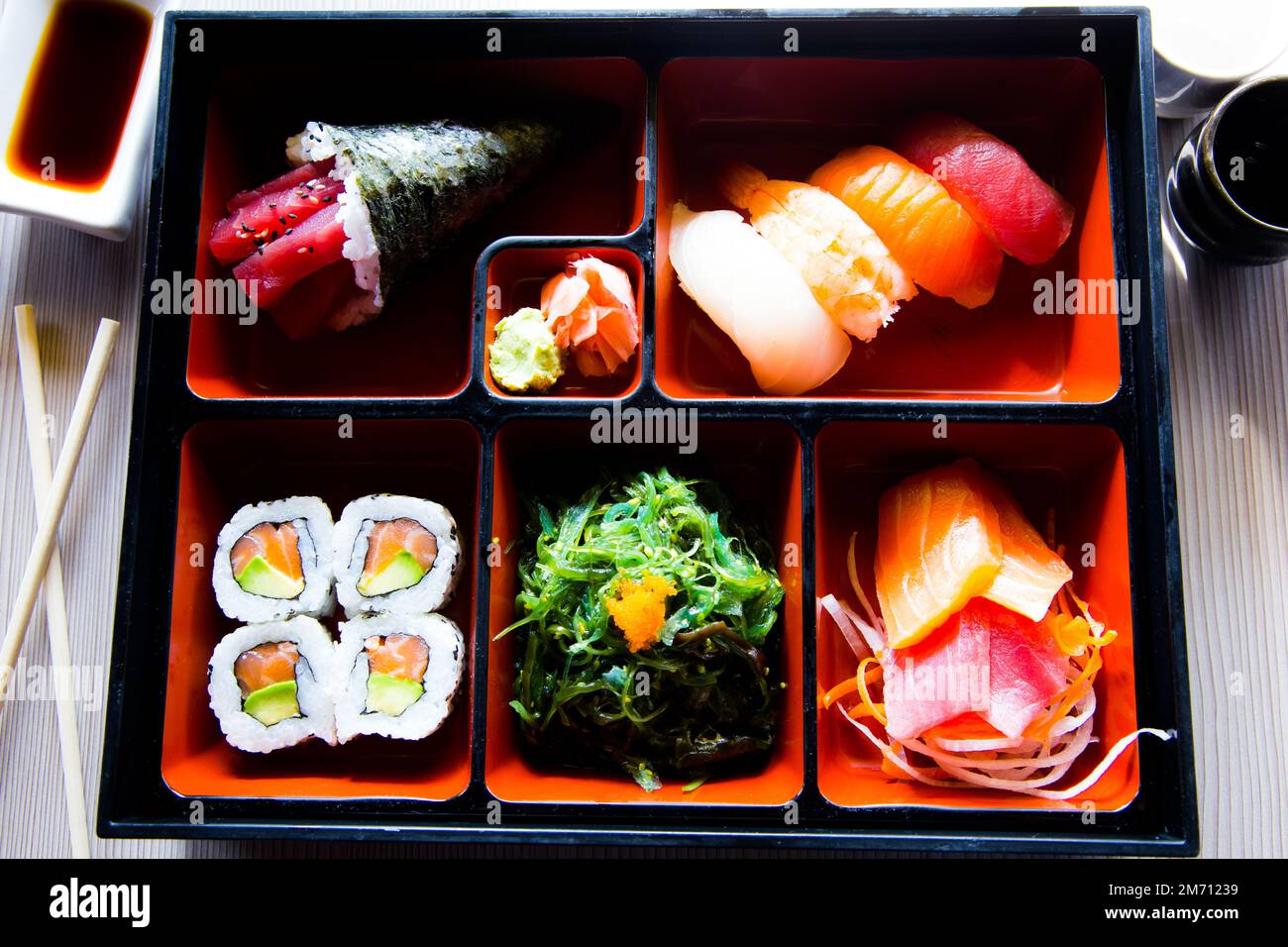 Set of sushi with variety of makis, nigiris and sashimi with fine fish ...