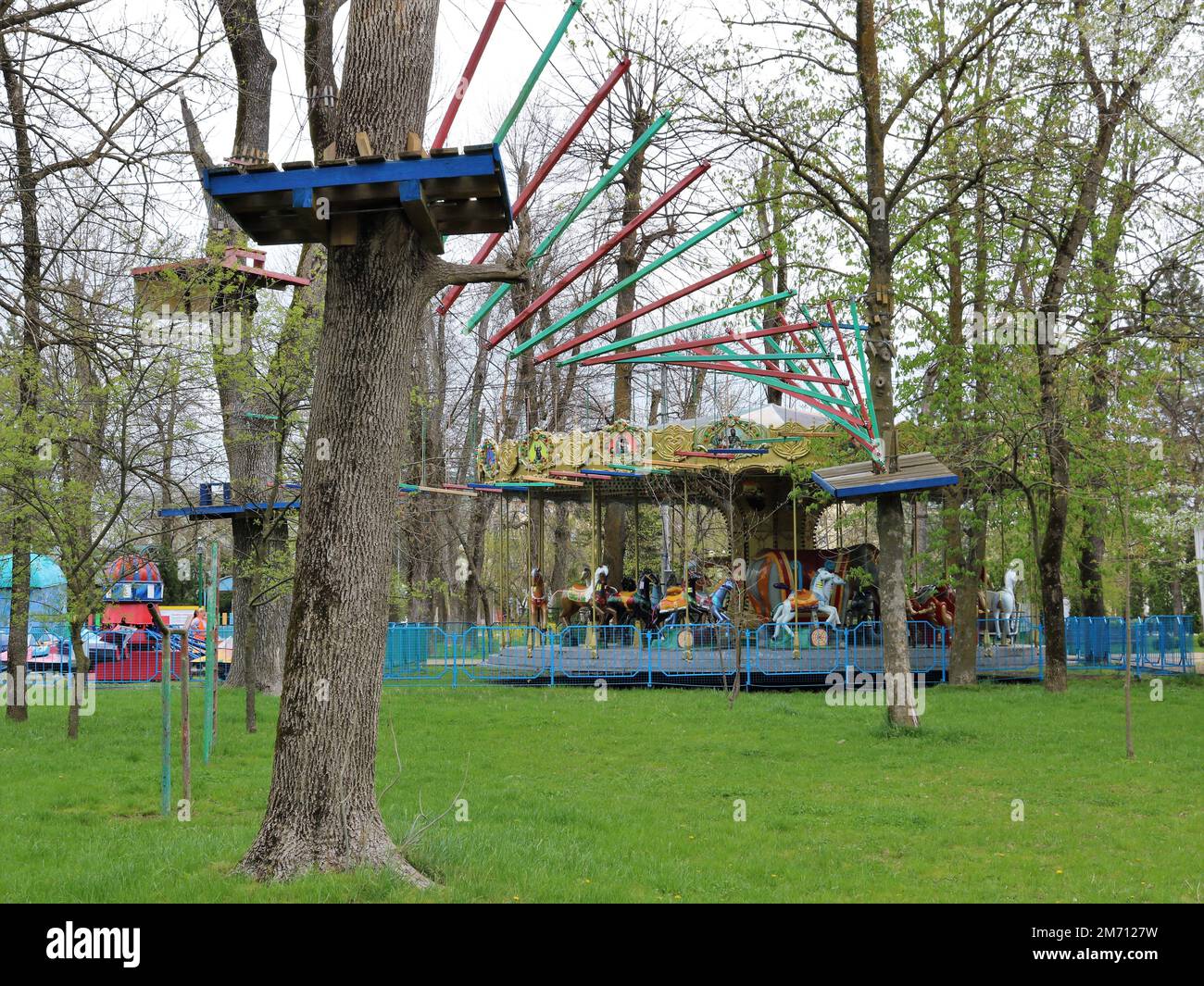 part of a rope attraction against the background of a circular horse ...