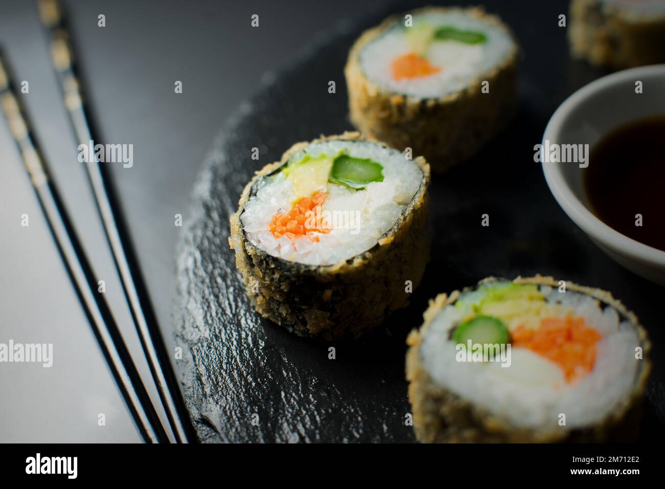Vegetarian hot roll. Sushi roll stuffed with vegetables and fried whole ...