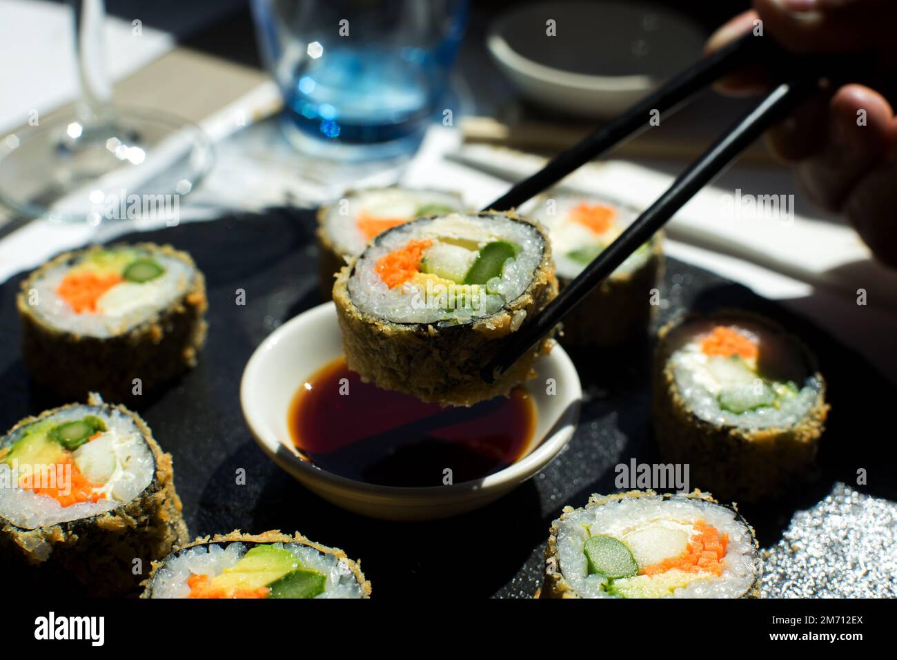 Vegetarian hot roll. Sushi roll stuffed with vegetables and fried whole ...