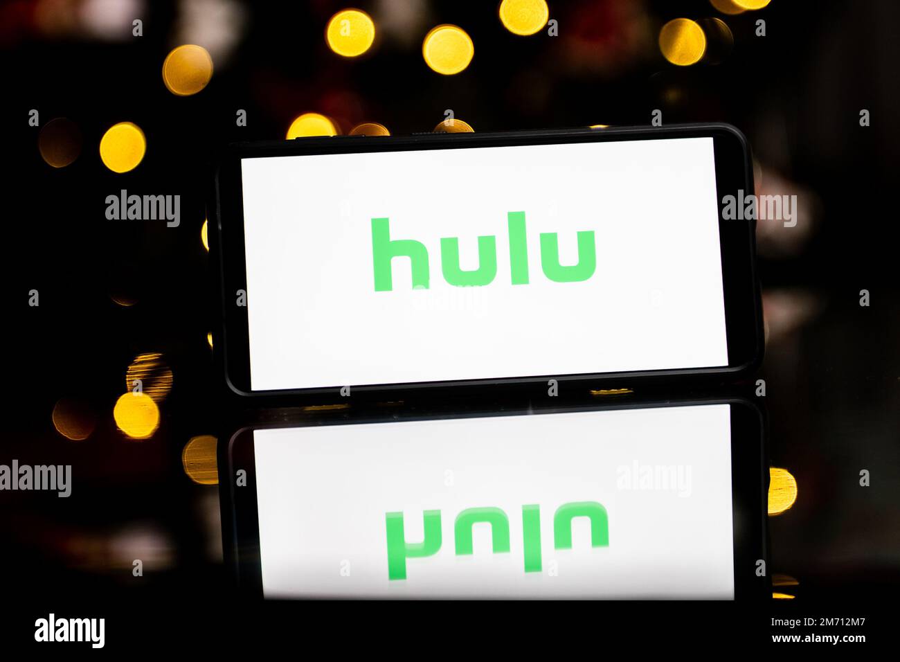 In this photo illustration a Hulu logo seen displayed on a smartphone ...