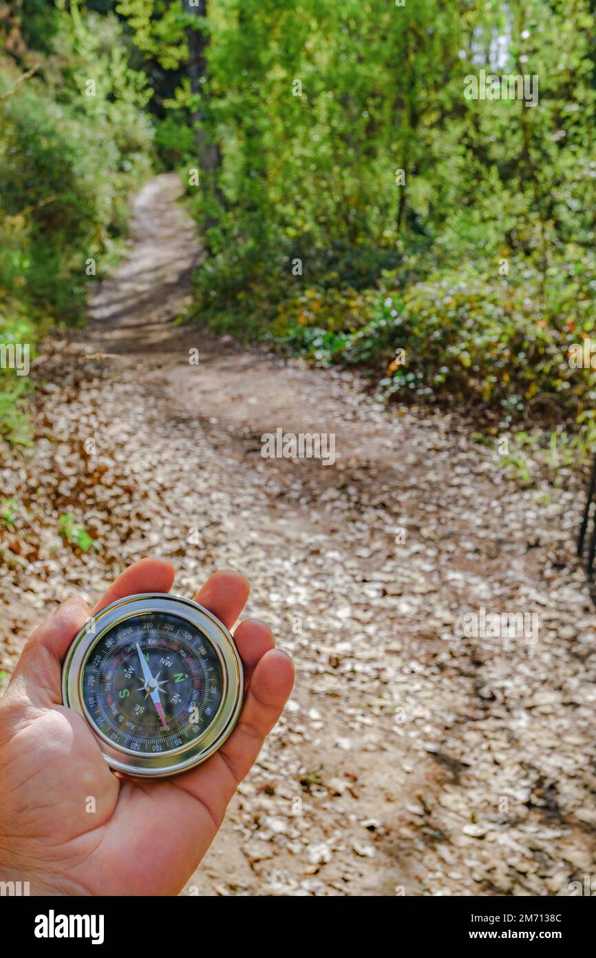 Compass on a forest trail Stock Photo - Alamy