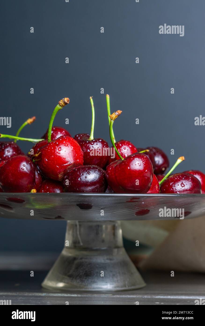 Fresh red summer cherries with water drops Stock Photo - Alamy