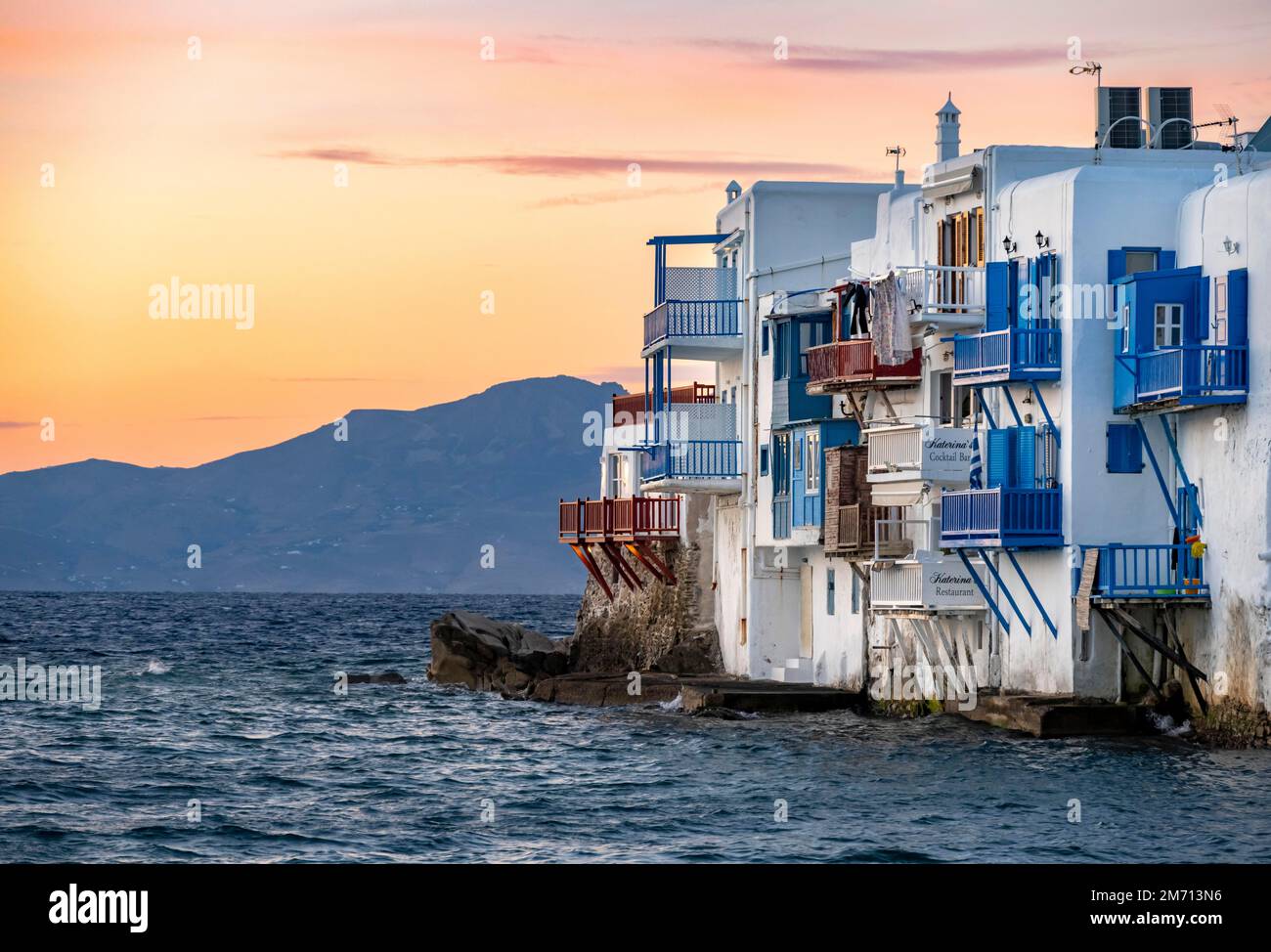 White Cycladic houses on the shore, Little Venice at sunset, Chora ...