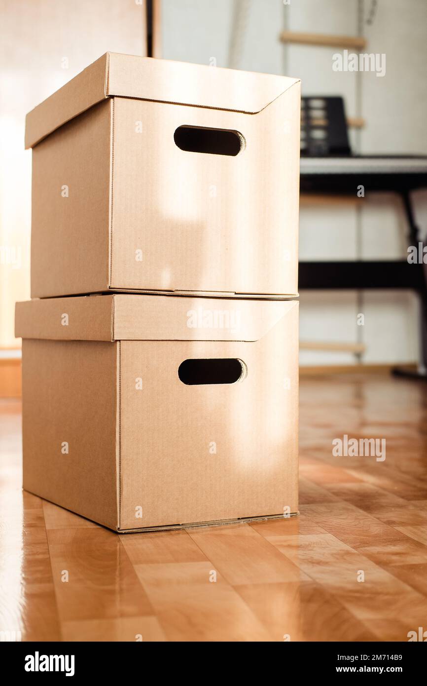 boxes on top of each other close-up on the floor. Moving theme with ...