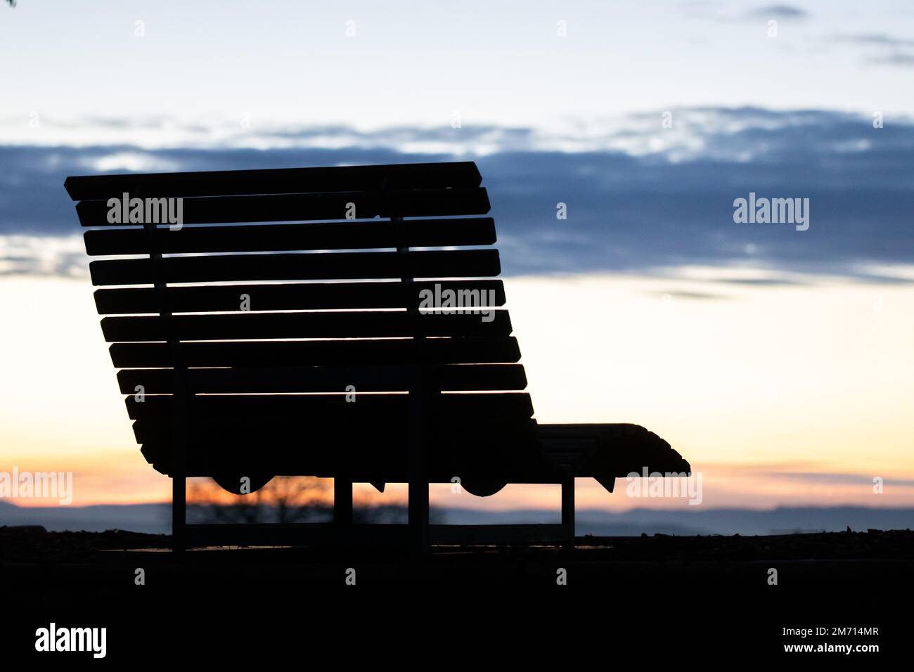 Wooden bench in dawn hi-res stock photography and images - Alamy