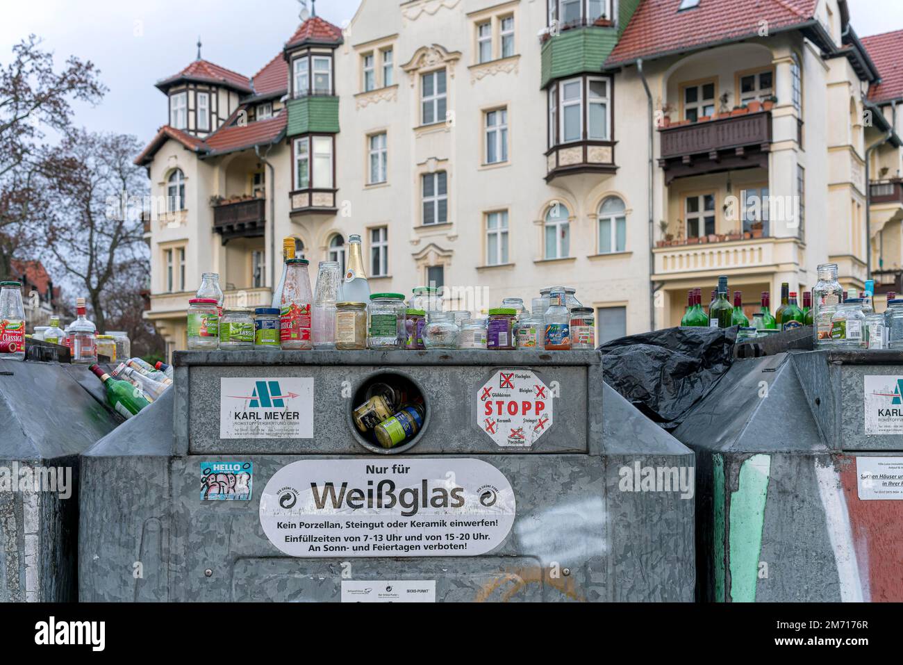 Overfilled containers for white glass and green glass, Berlin, Germany ...