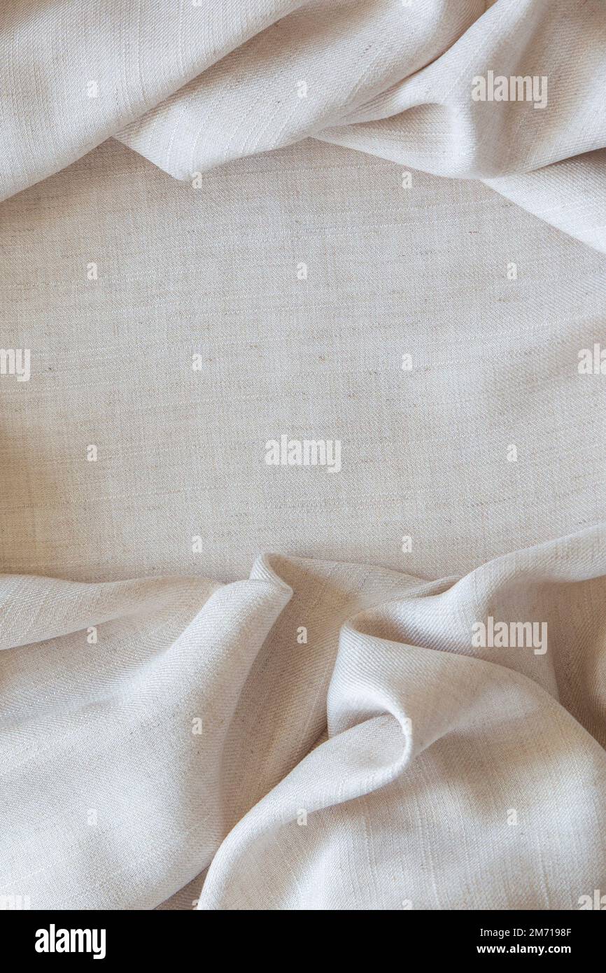 White crumpled linen fabric texture background. Natural off white wavy ...