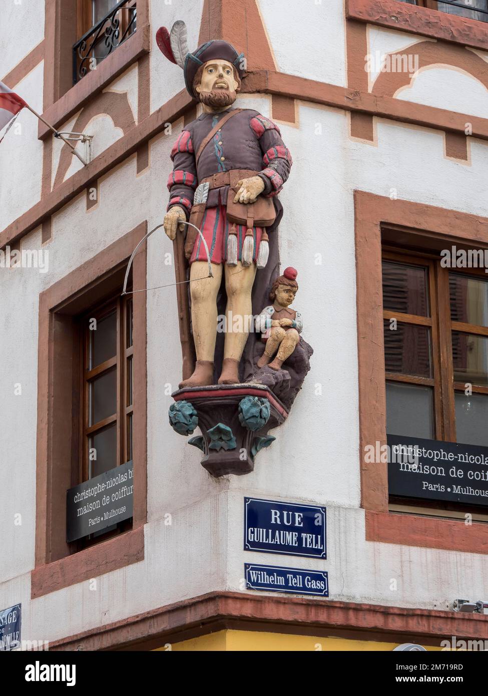Corner of the half-timbered house with the carved figures of William ...