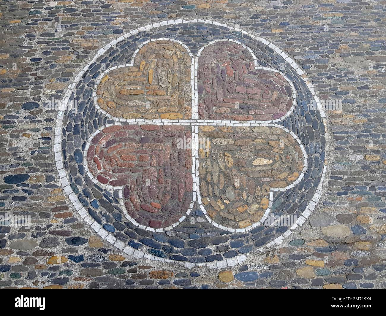Typical pavement mosaic on the pavement (pavement) in the city centre ...