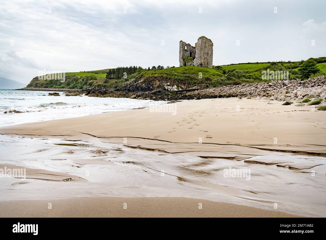 The remains of Minard Castle from Minard Beach, County Kerry, Ireland ...