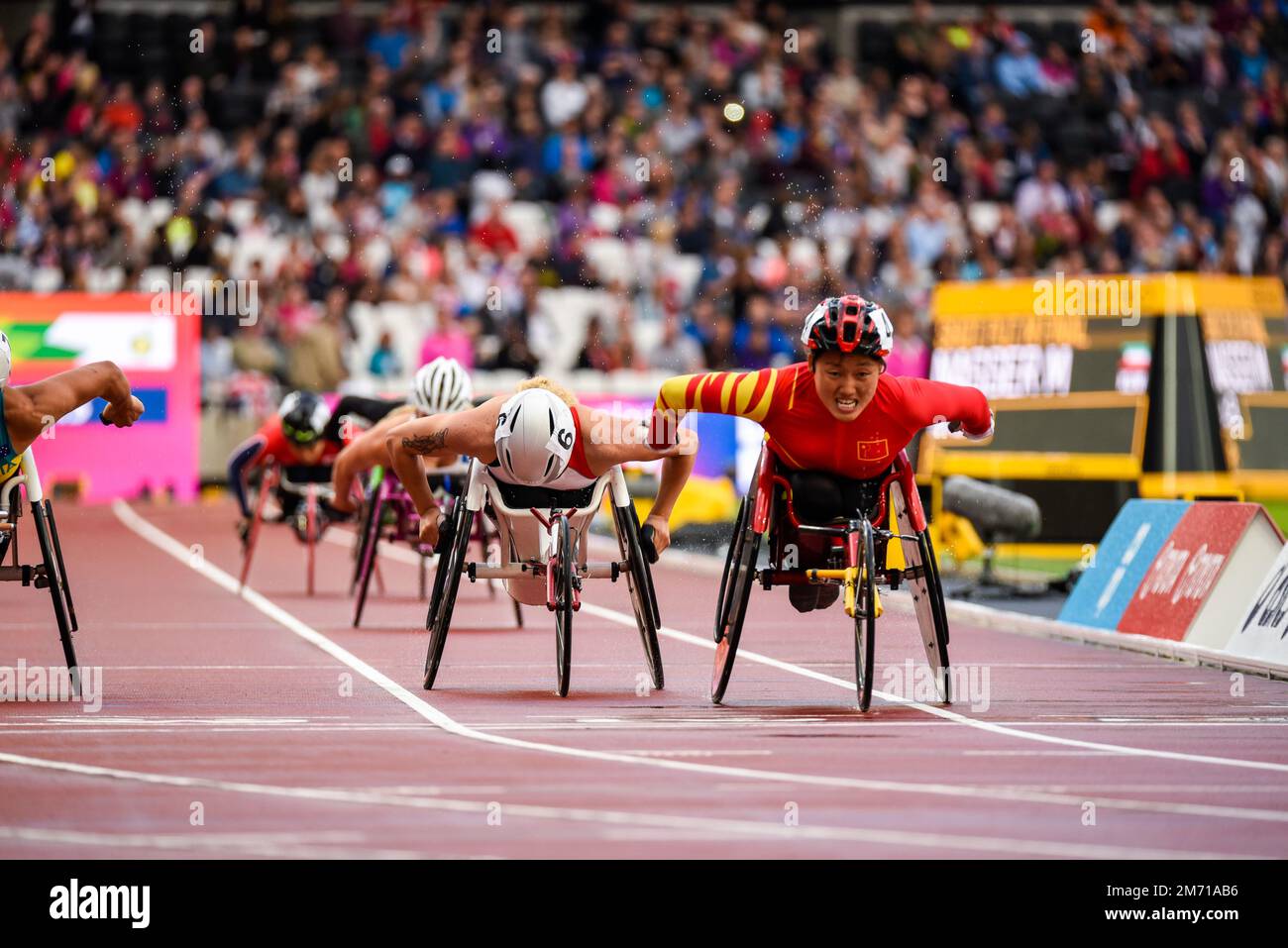 Hongzhuan Zhou winning the 800m T53 wheelchair race at the 2017 World ...