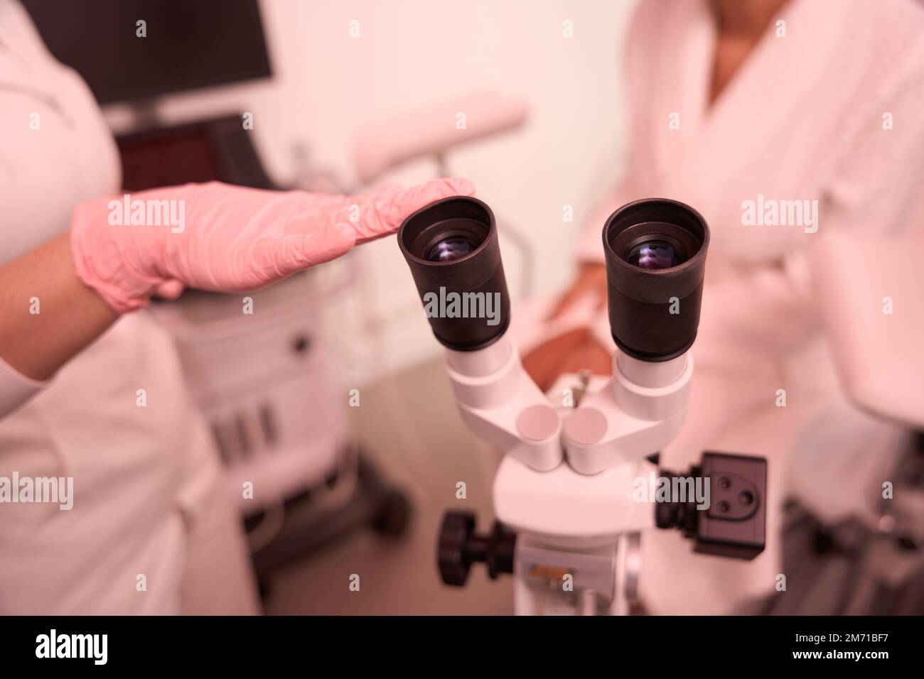Close up photo of gynecologist showing examination device Stock Photo ...