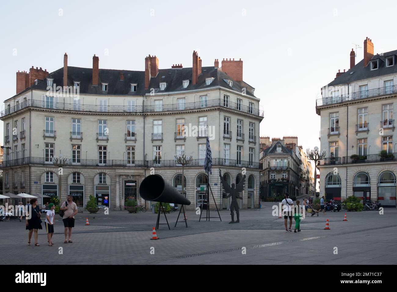 A beautiful shot of historic buildings and people walking around in ...
