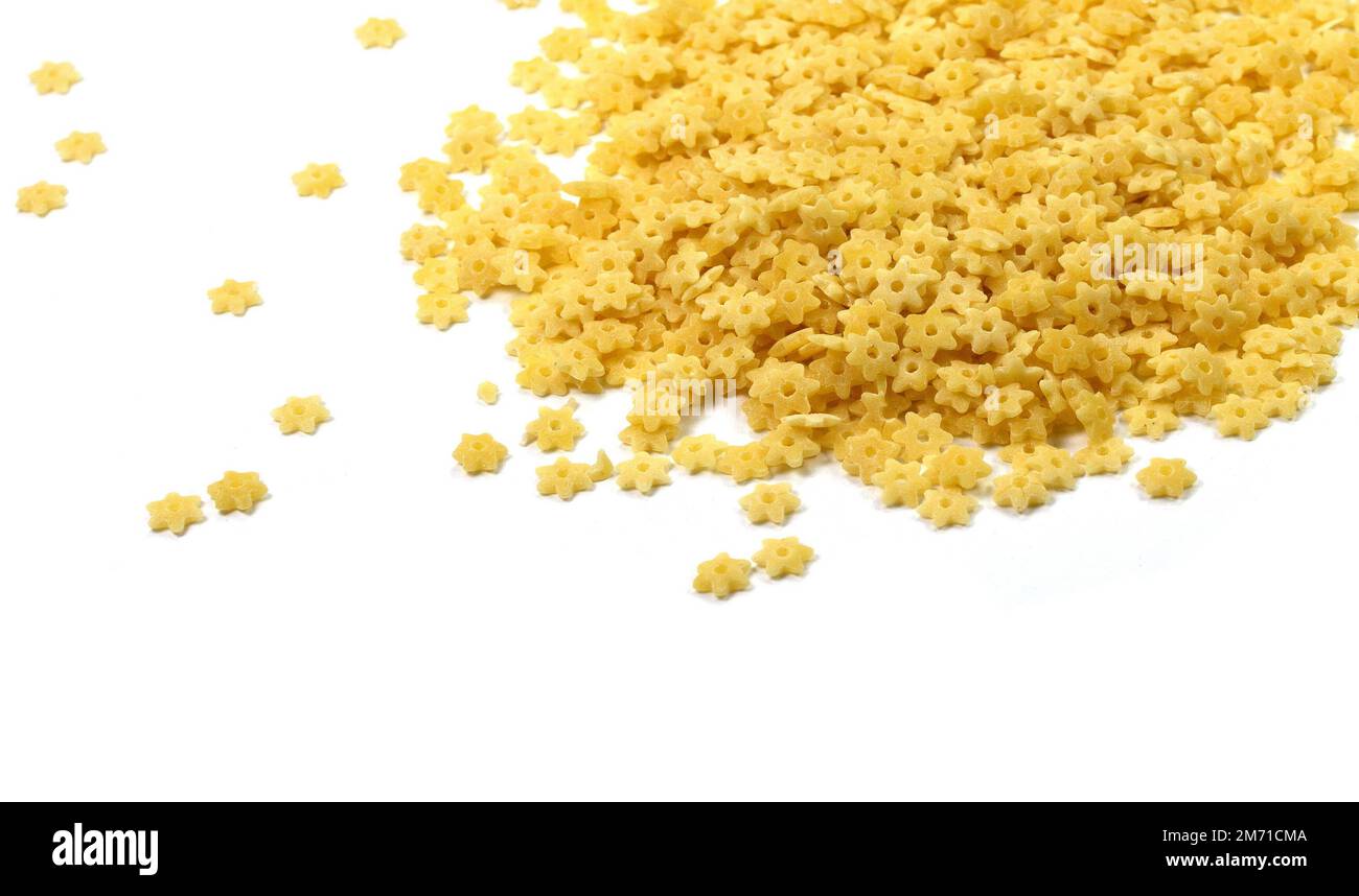 Pasta star shape isolated on white background. A portion of stars ...