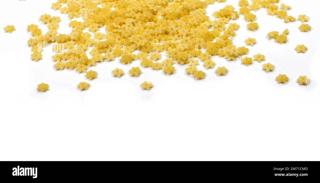 Pasta star shape isolated on white background. A portion of stars ...