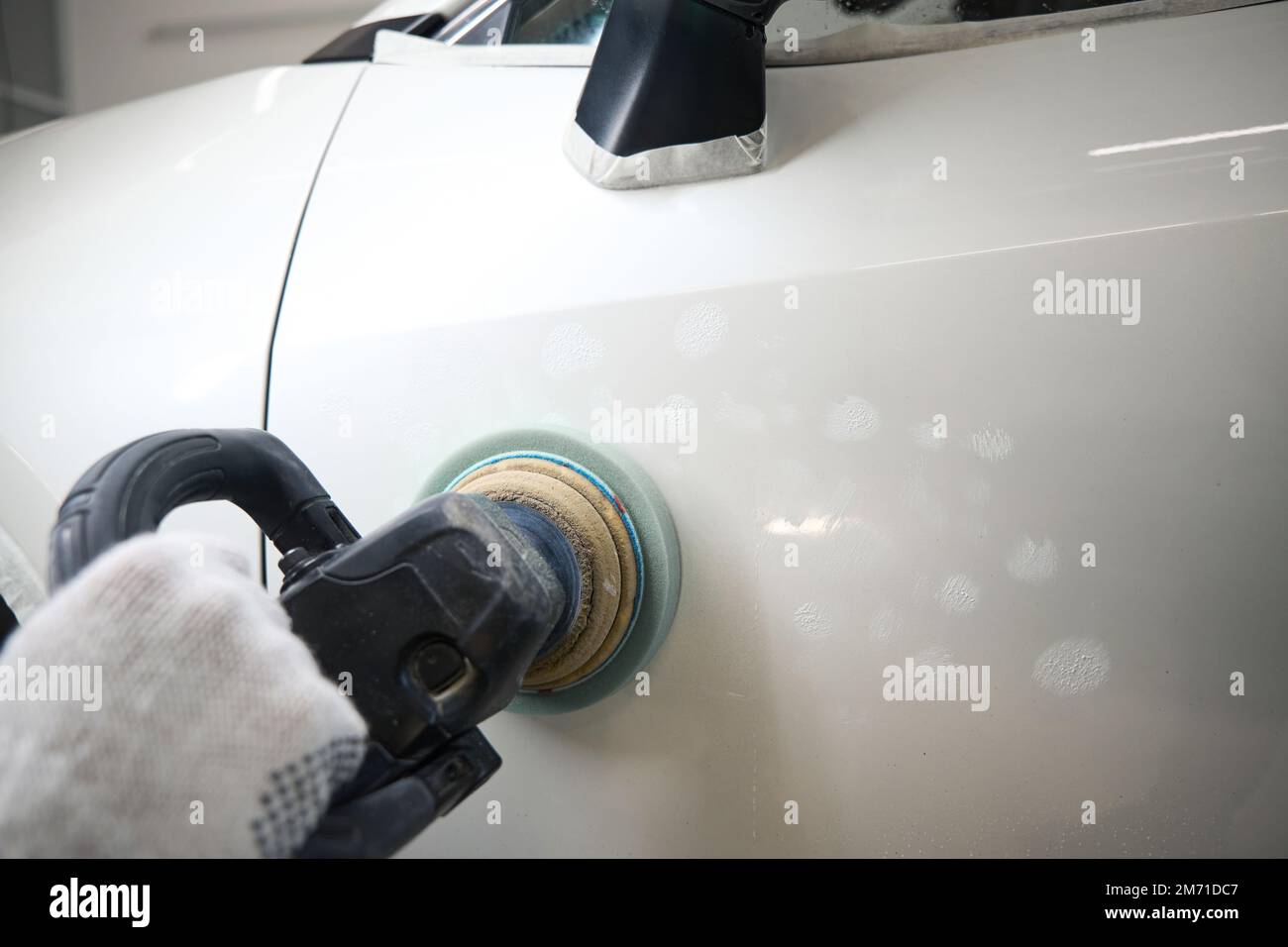 Auto mechanic painting car in hi-res stock photography and images - Alamy