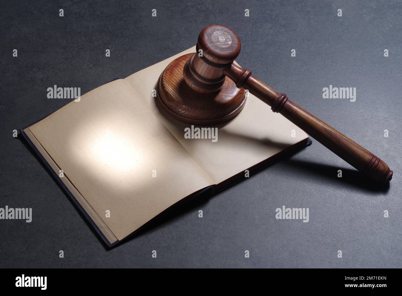 Legal concept of law and justice. Open notebook law book with wooden ...