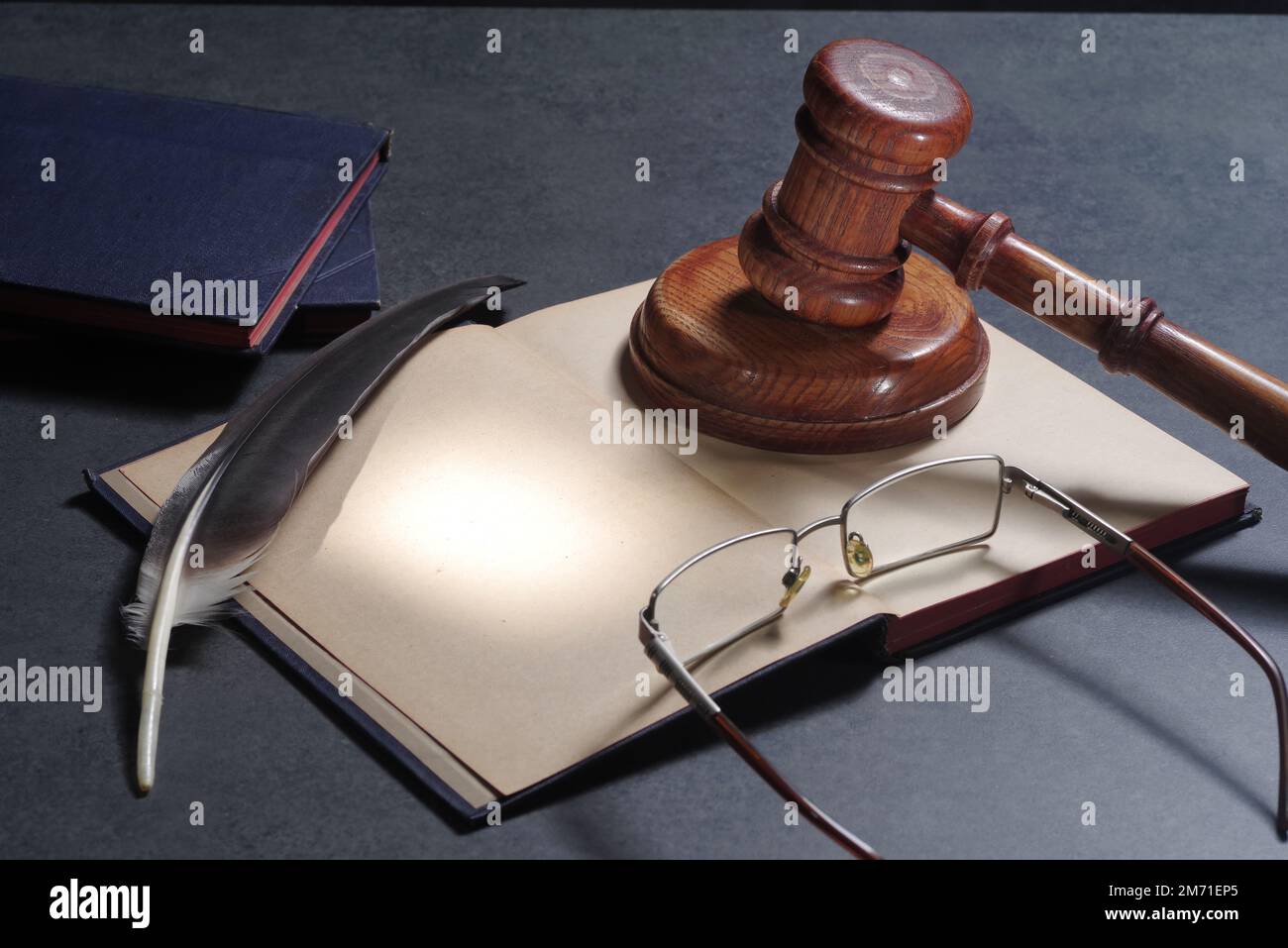 Legal concept of law and justice. Open notebook law book with wooden ...
