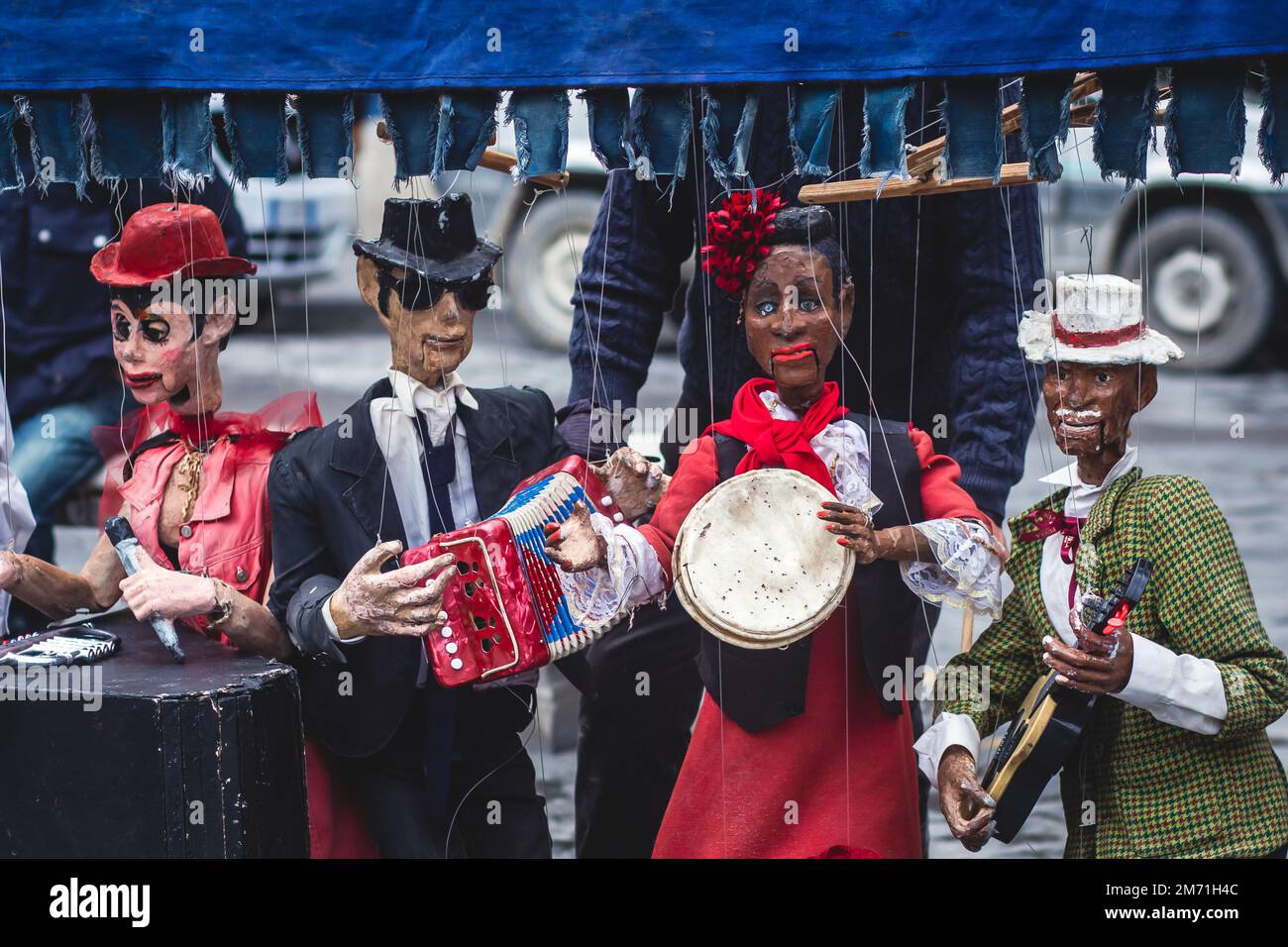 View of street puppet show theatre, with puppeteer puppet master ...