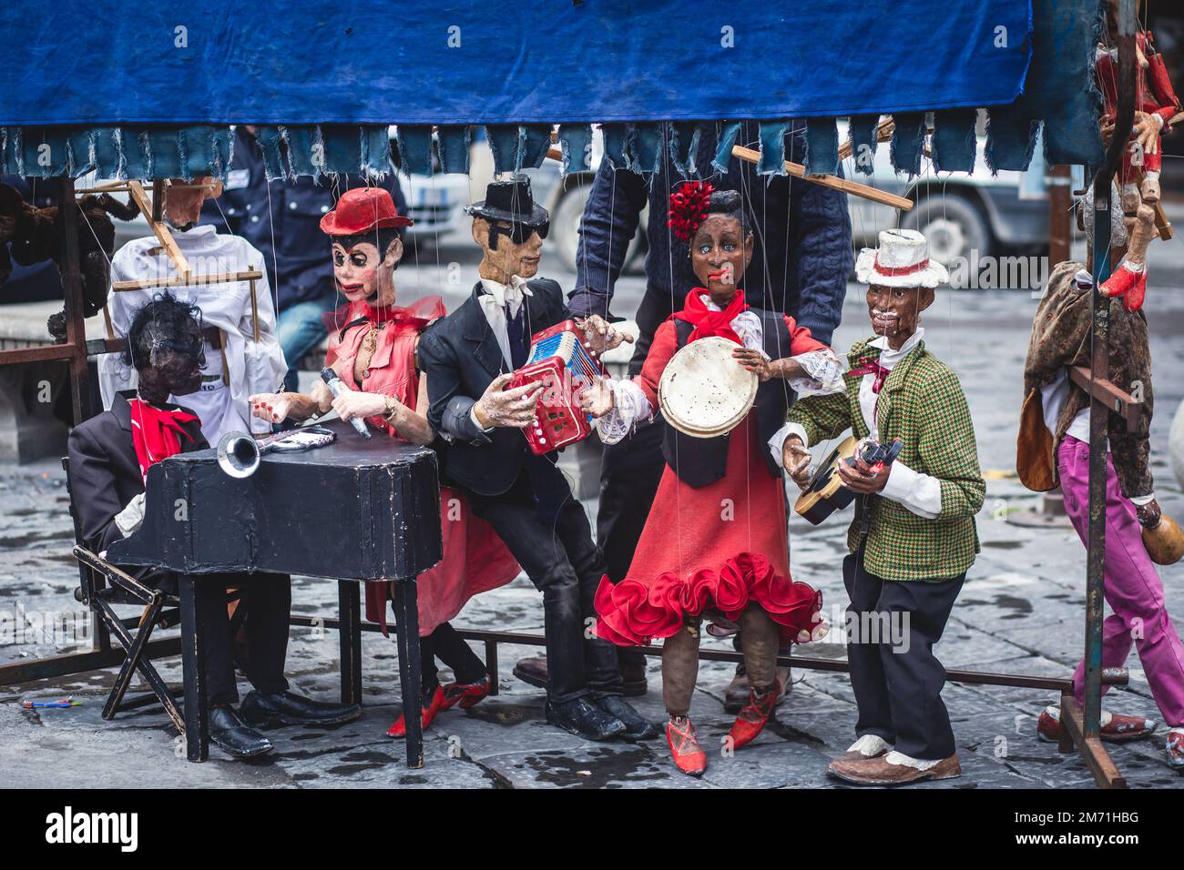 View of street puppet show theatre, with puppeteer puppet master ...