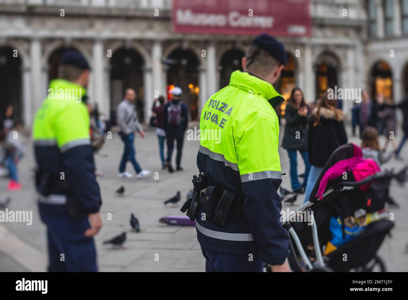 Italian police squad patrol formation back view with "Local Police ...