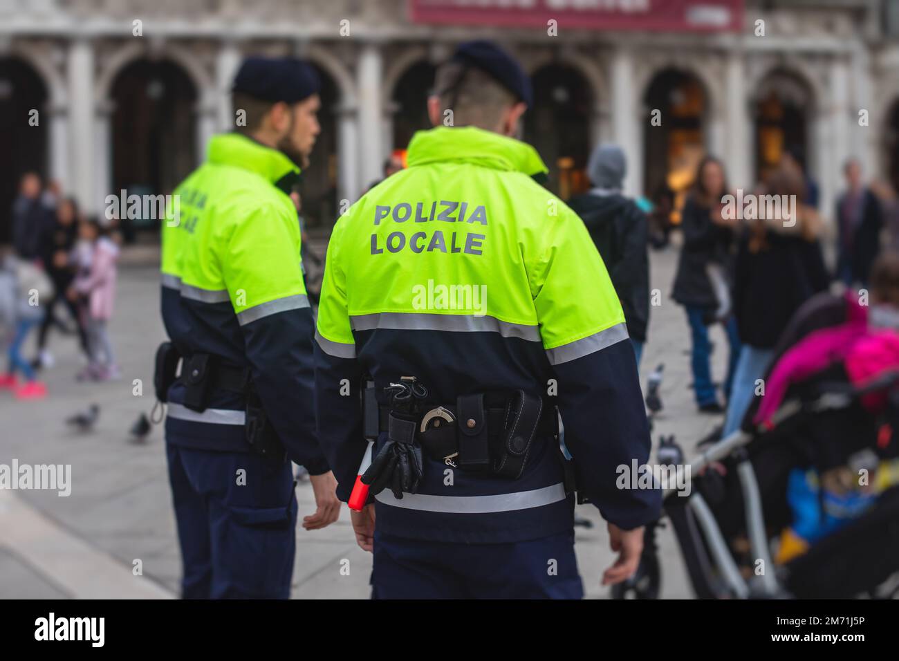 Italian police squad patrol formation back view with "Local Police ...