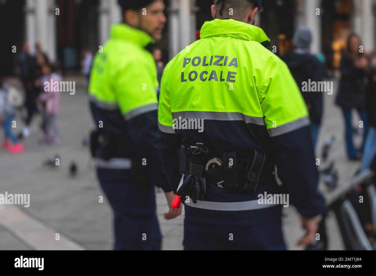 Italian police squad patrol formation back view with "Local Police ...