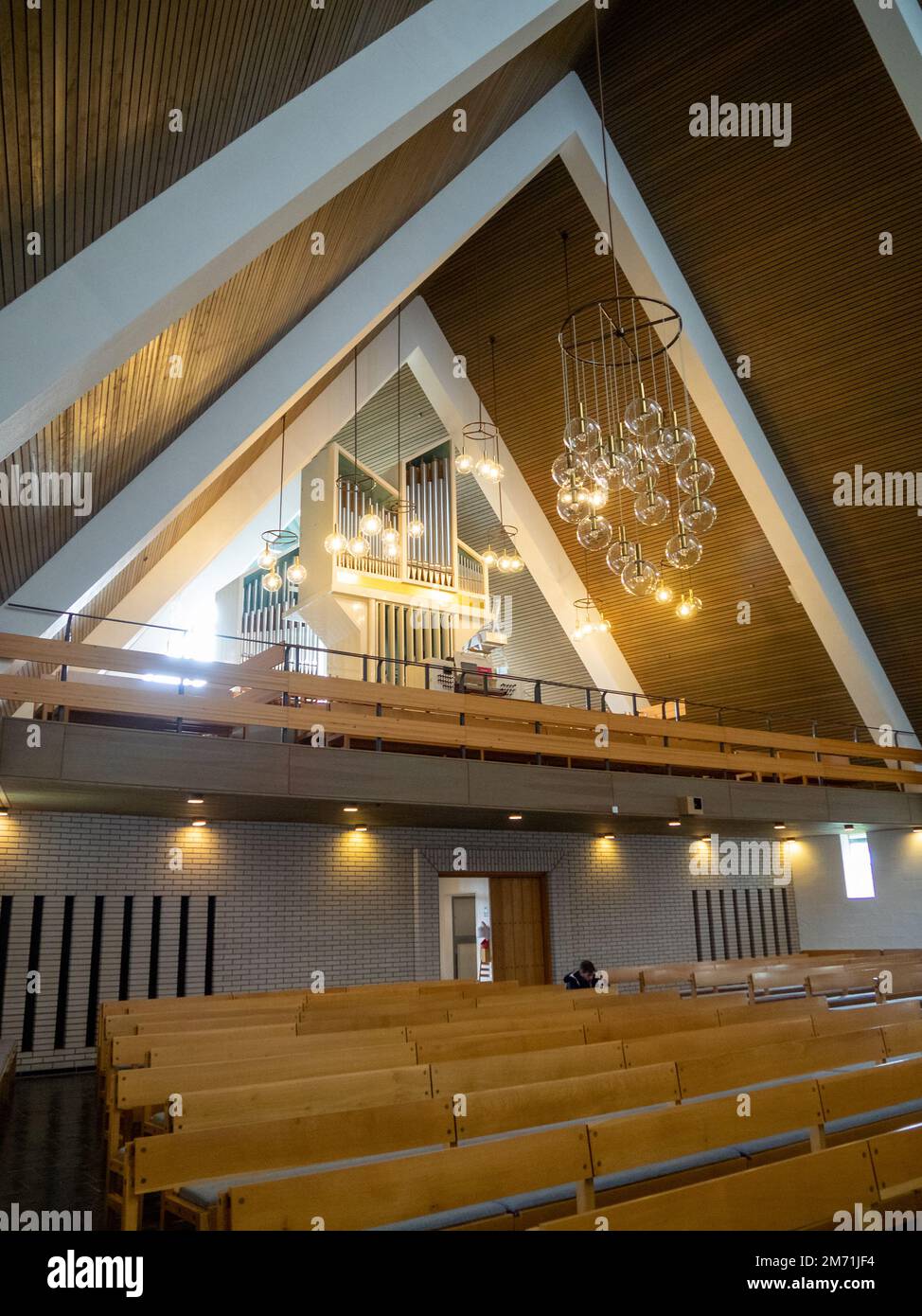 Vesturkirkjan church triangular interior, view to the pipes organ Stock ...
