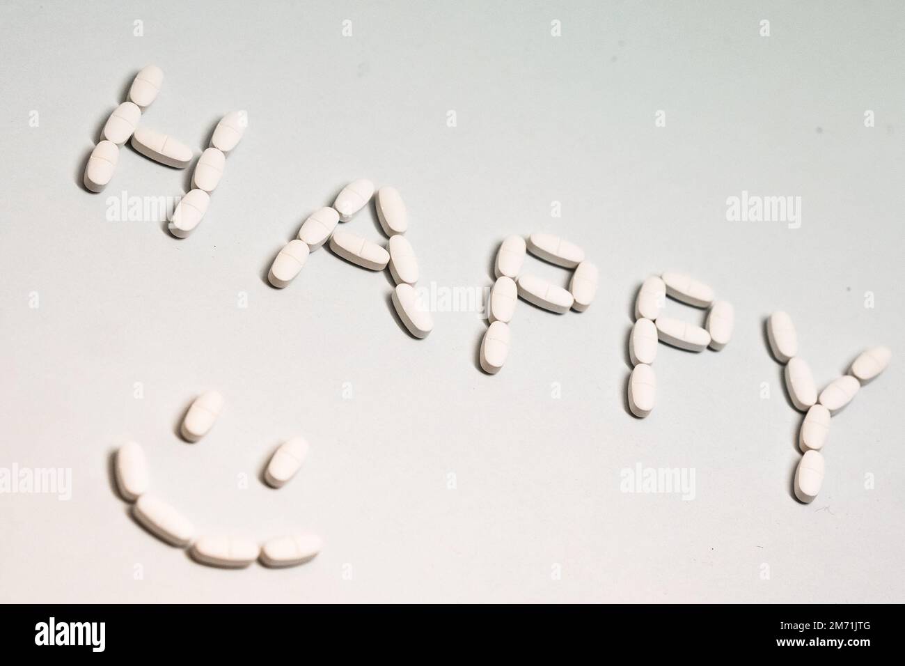 Smiley face pills hi-res stock photography and images - Alamy
