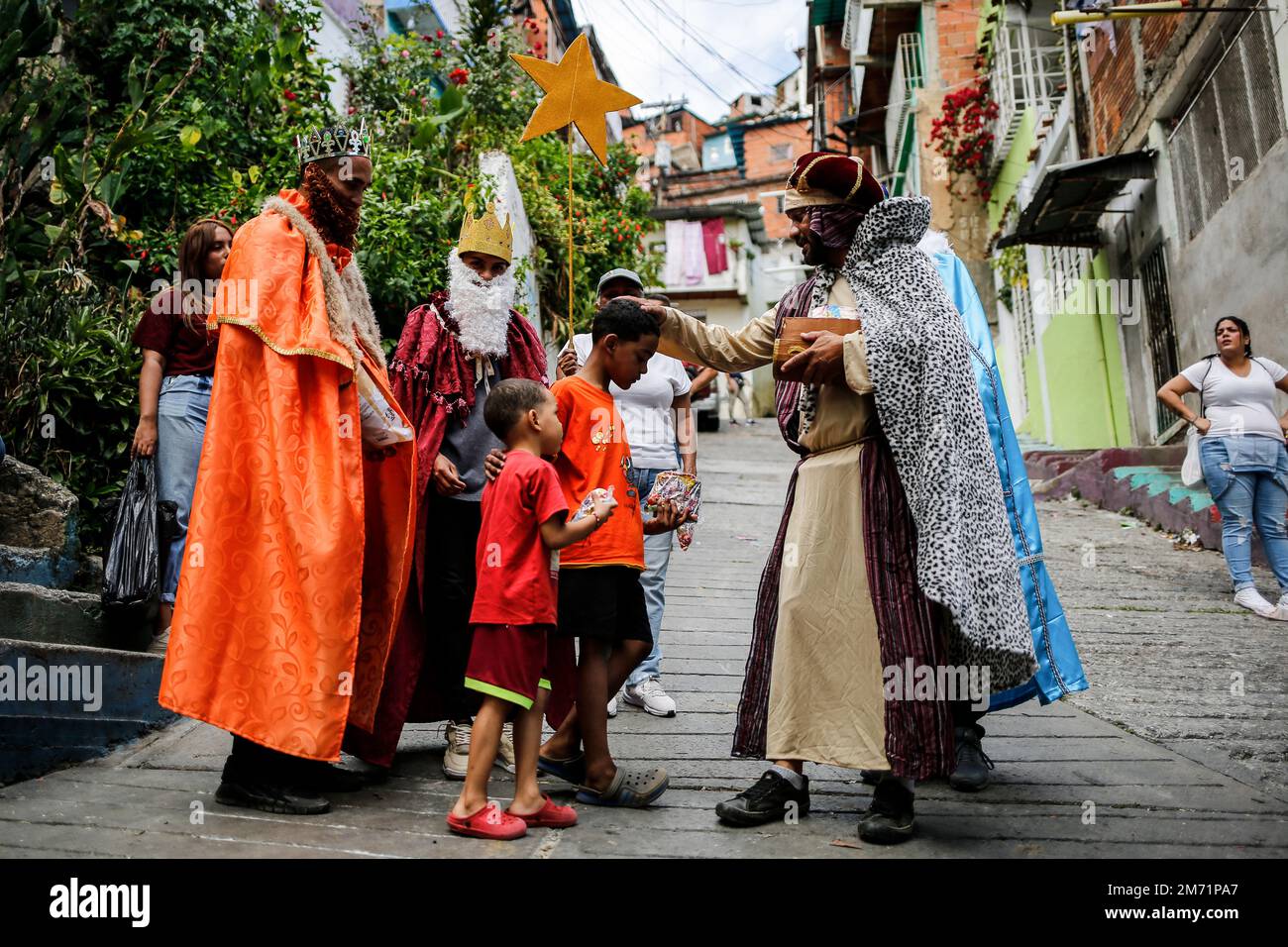 Caracas, Venezuela. 06th Jan, 2023. Men dressed as Magi donate gifts ...