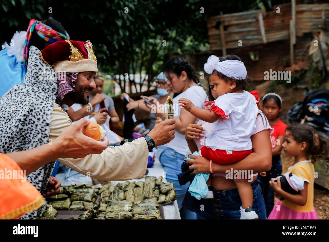 Caracas, Venezuela. 06th Jan, 2023. Men dressed as Magi donate gifts ...