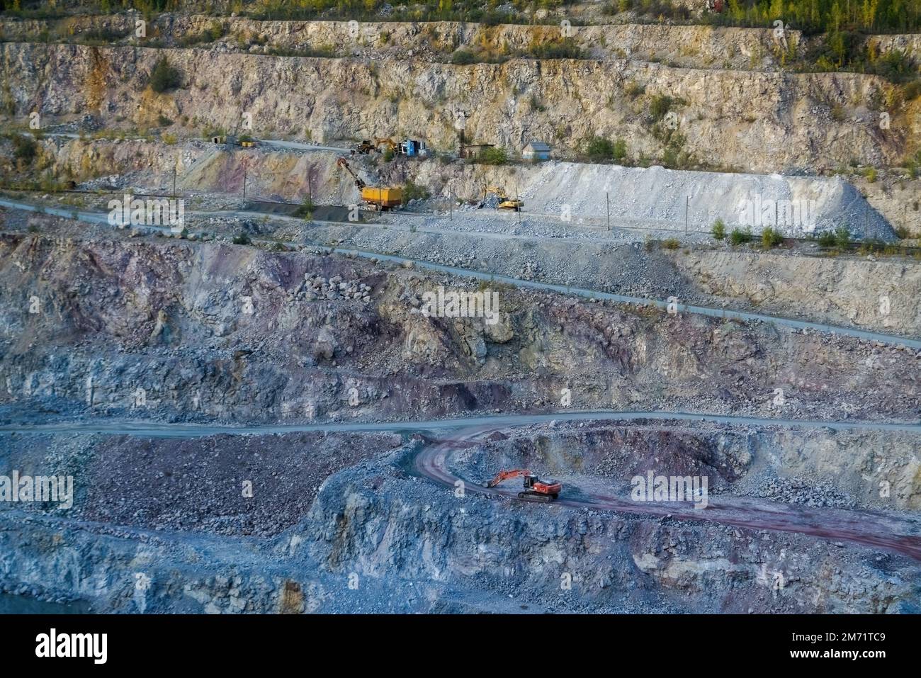 Dolomite quarry Photo from the top. Industrial terraces in a mining ...