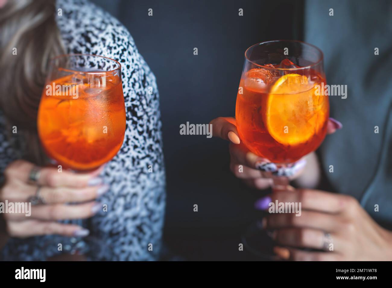 View of alcohol setting on catering banquet table, row line of orange ...