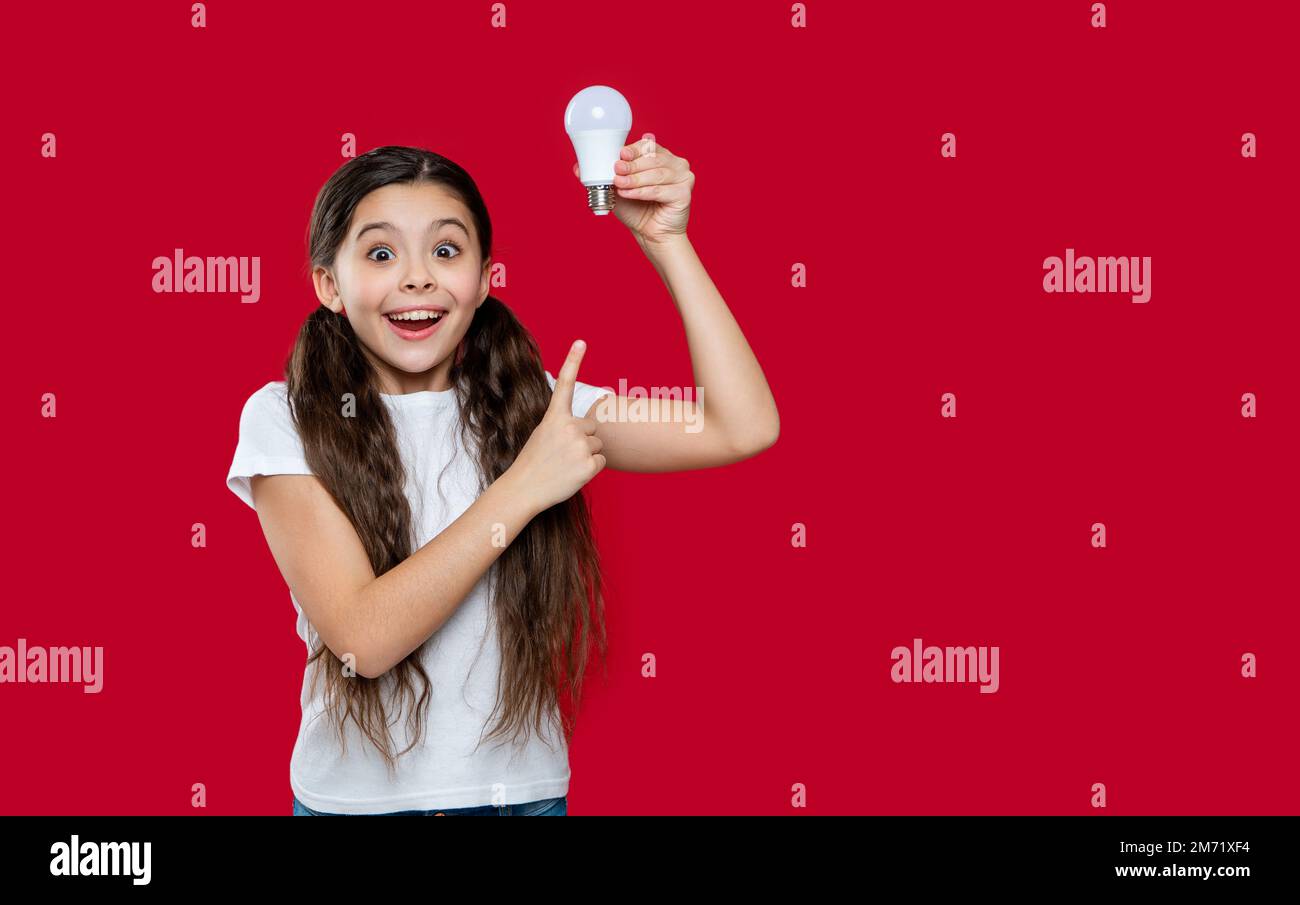 teen genius girl in studio, copy space. teen genius girl on background ...