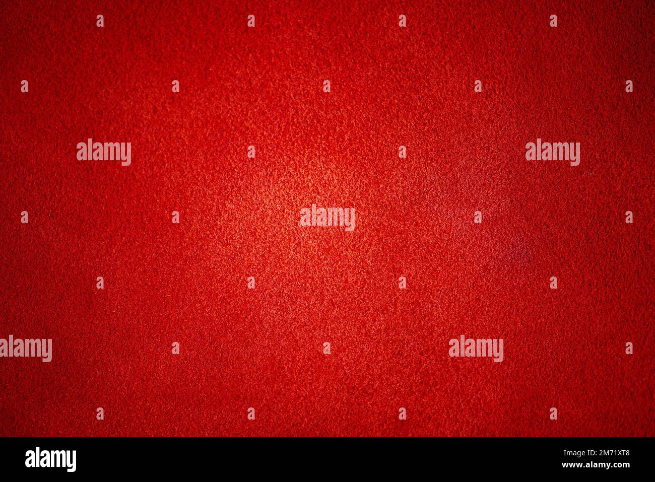 Macro photo of natural suede dyed in red. Suede red background with a ...