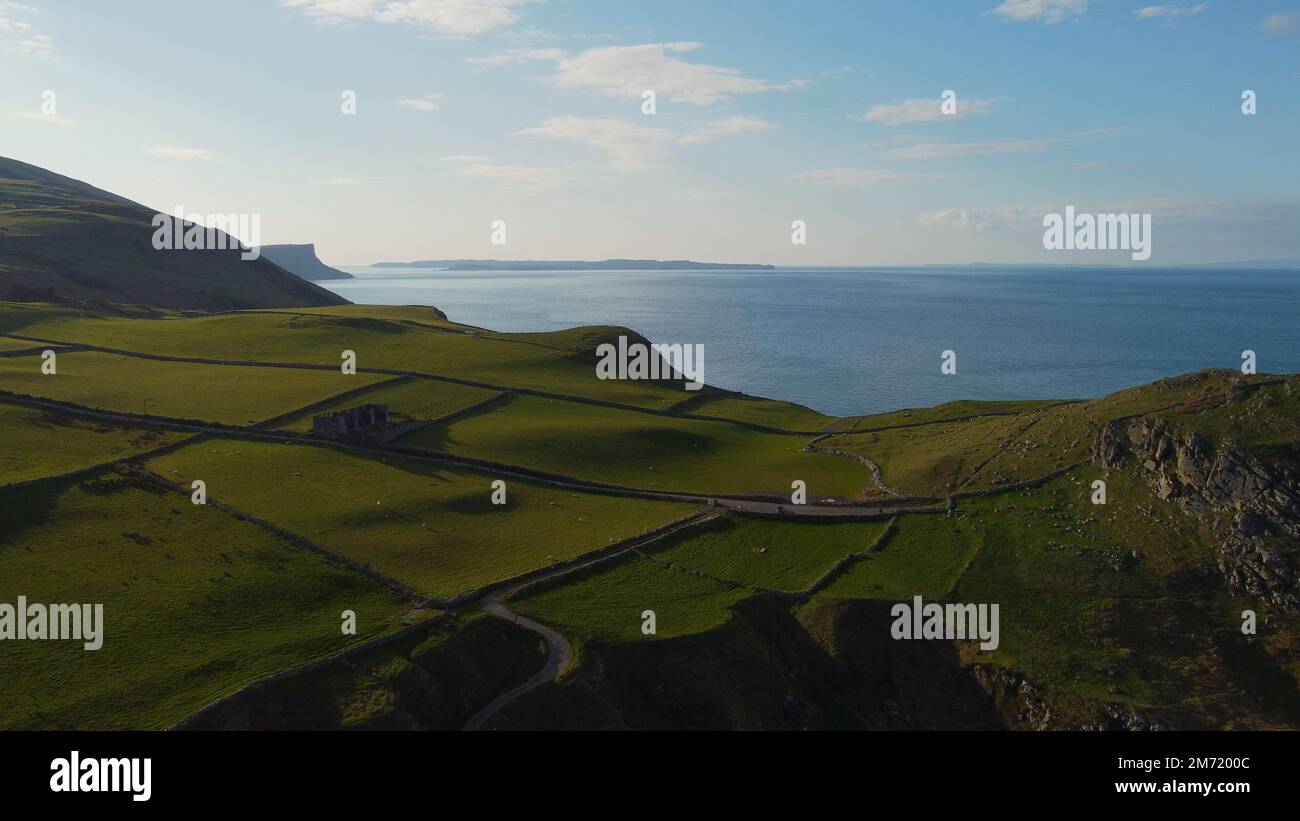 The beautiful Causeway Coast at Torre Head in Northern Ireland - aerial ...