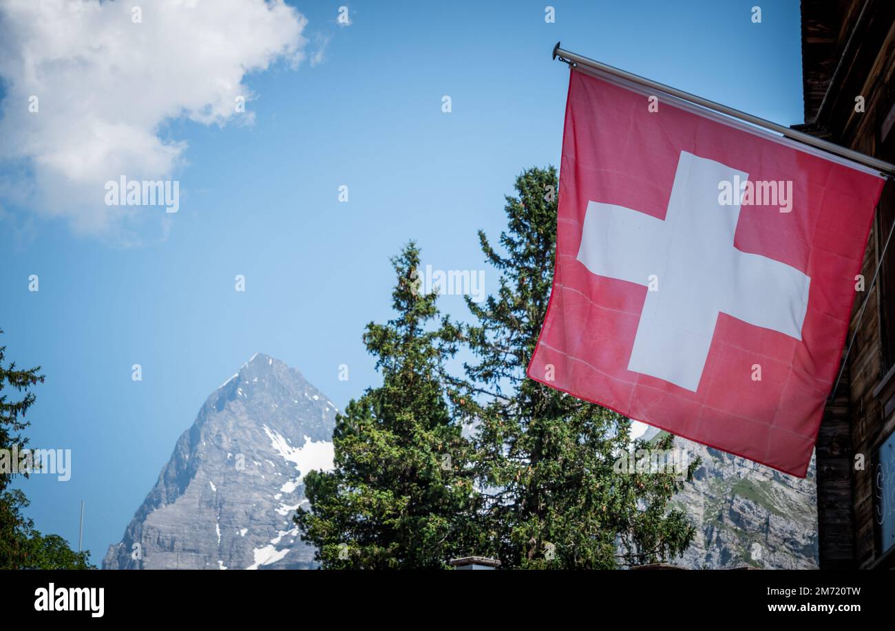 Swiss Flag in the Swiss Alps of Switzerland Stock Photo - Alamy