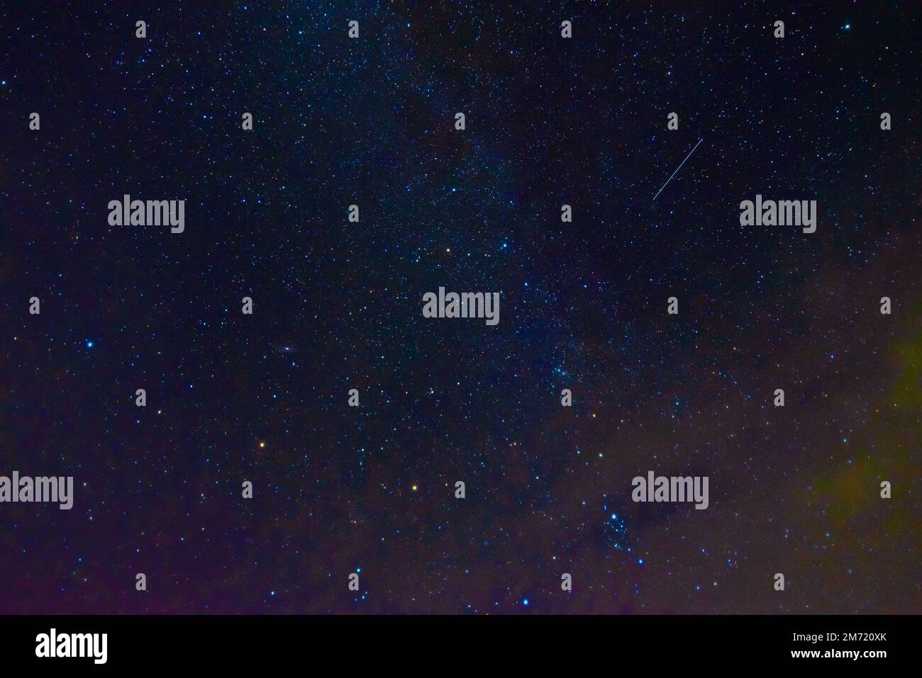 Astrophotography of a dark blue starry sky with many stars, nebulae and ...