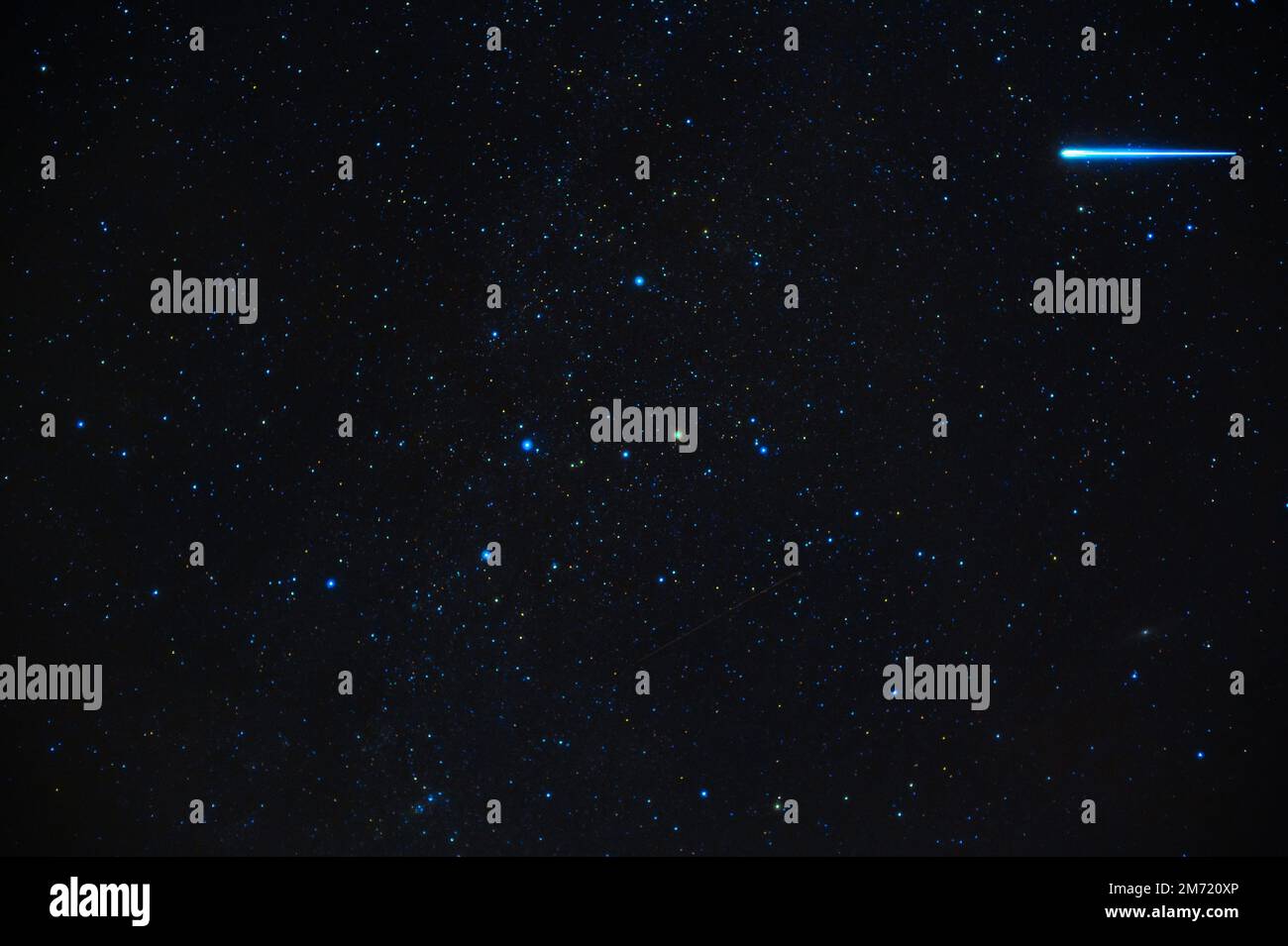 Glowing meteor shower on dark hi-res stock photography and images - Alamy