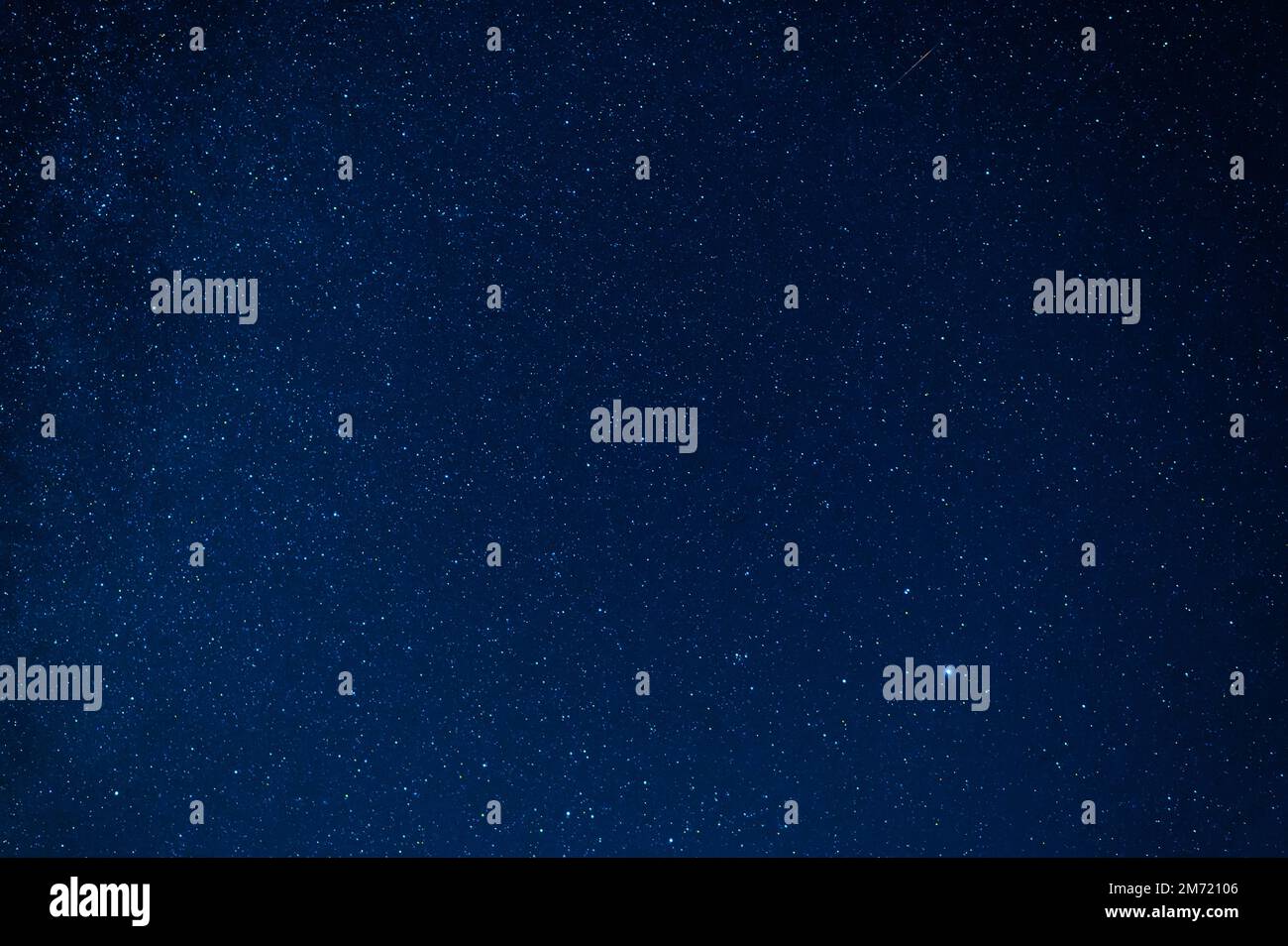 Astrophotography of a dark blue starry sky with many stars, nebulae and ...