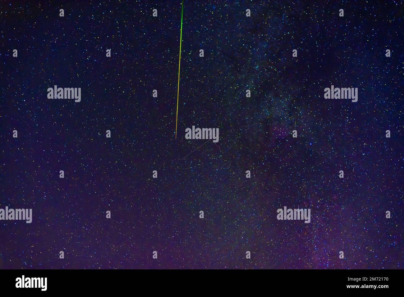 shooting star meteorite comet on the background of a blue dark starry ...