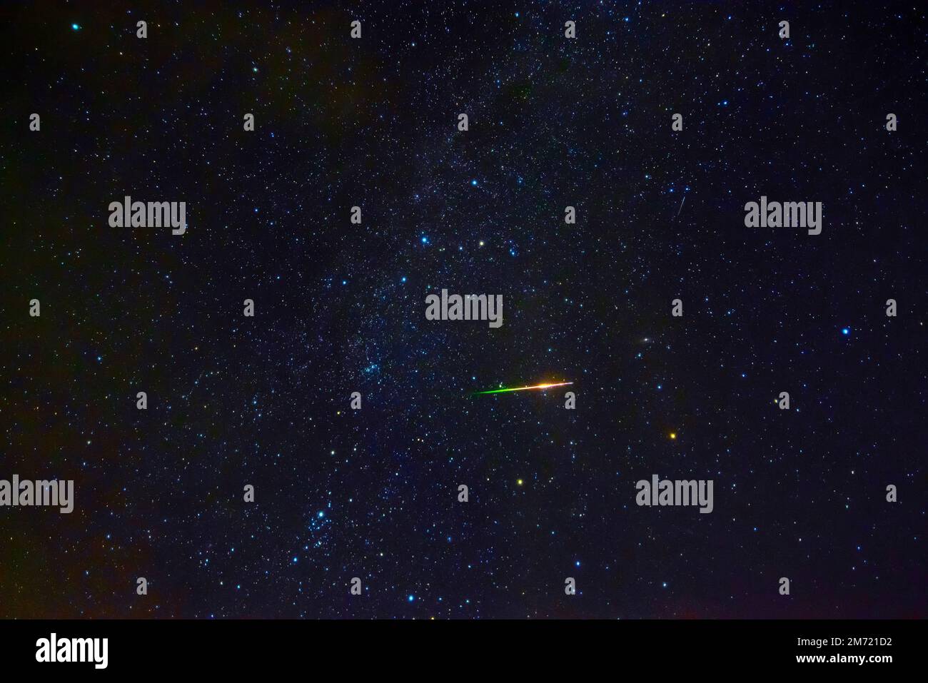 shooting star meteorite comet on the background of a blue dark starry ...