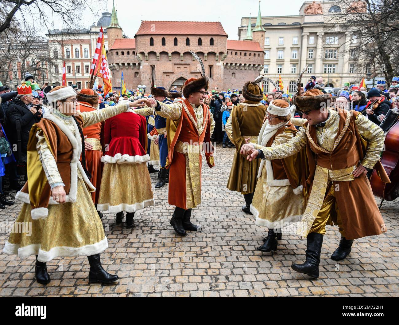Participants of the procession dance a polonaise in front of the ...