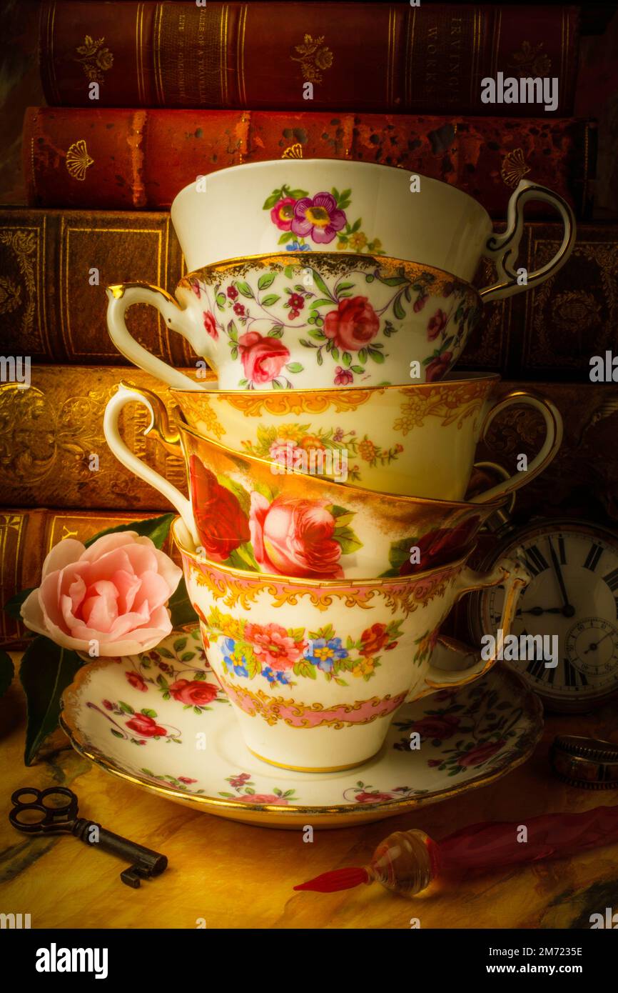 Books and cups hi-res stock photography and images - Alamy