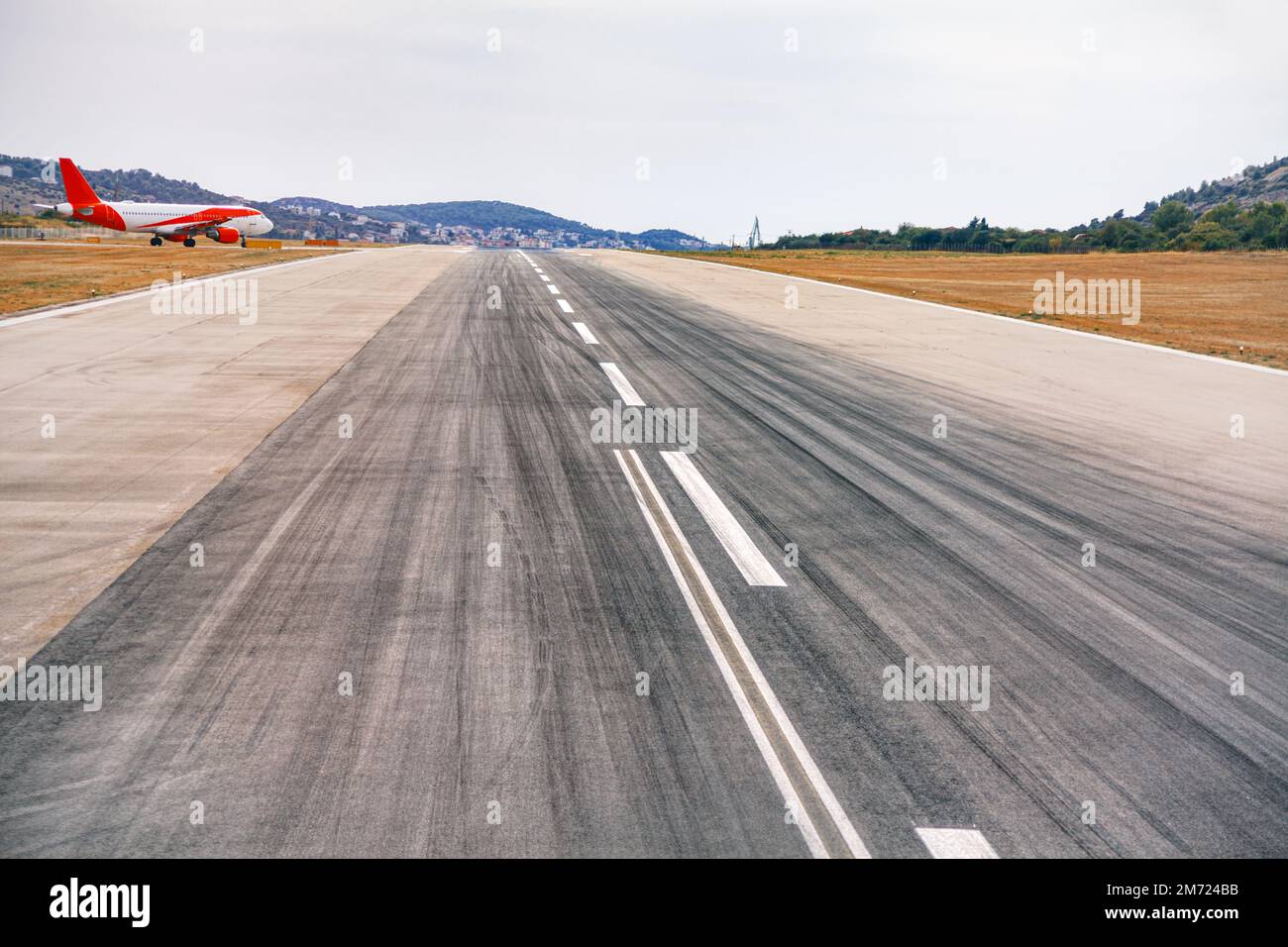 Acceleration on the runway . View from the cockpit . Rubber tracks on the runway Stock Photo - Alamy