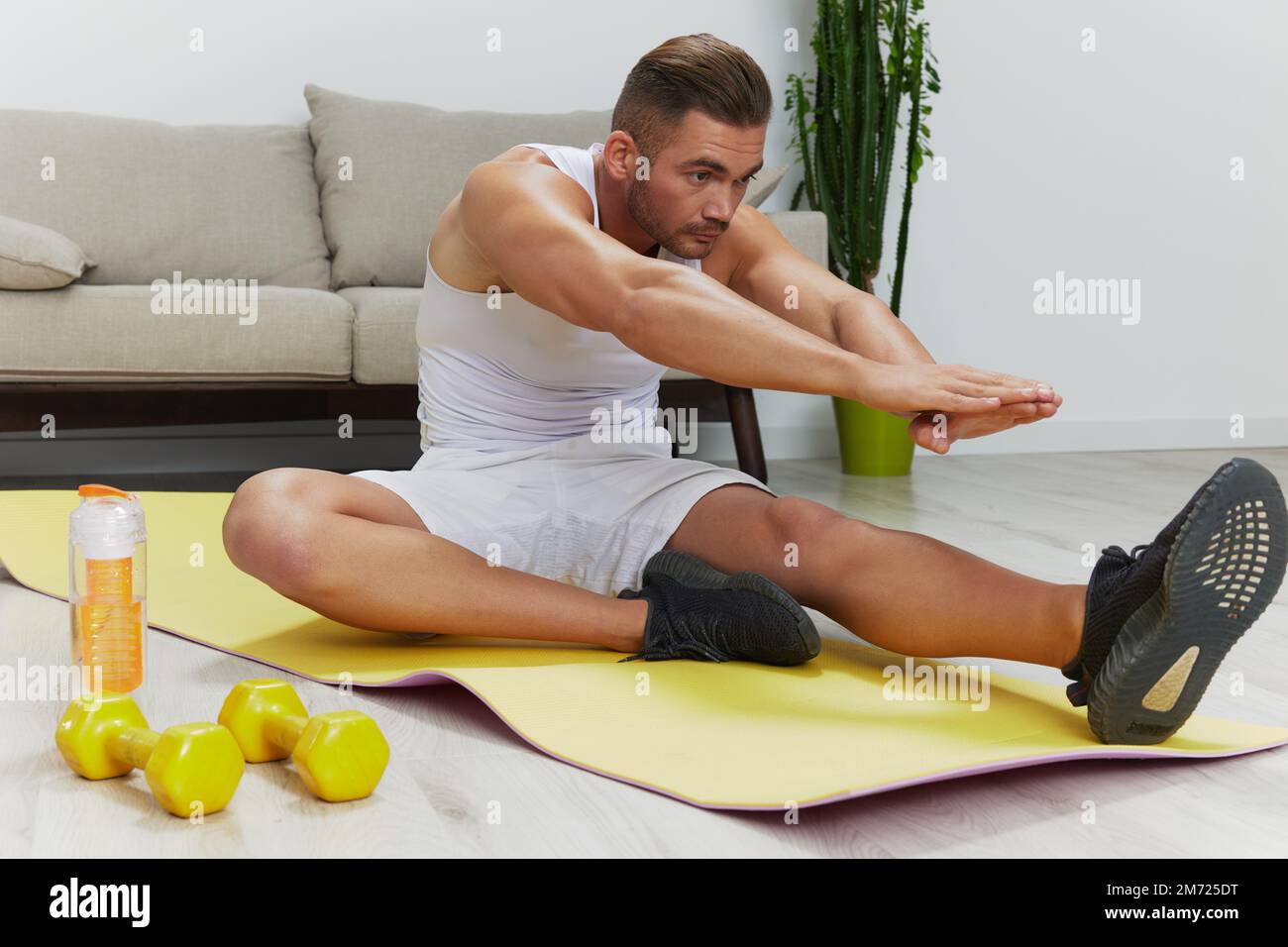 Man sport does muscle and body stretching, pumped up man fitness ...