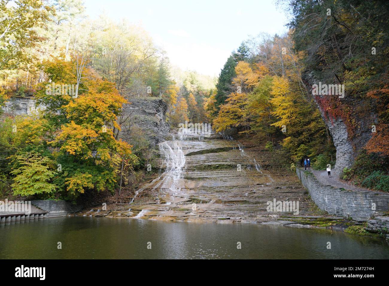 Beautiful waterfalls from above the hills with the background of fall ...